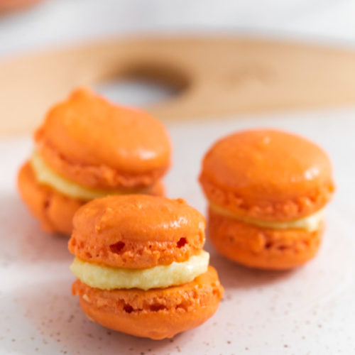 Pumpkin Macarons Recipe with Pumpkin Buttercream Filling #PumpkinWeek - April Golightly